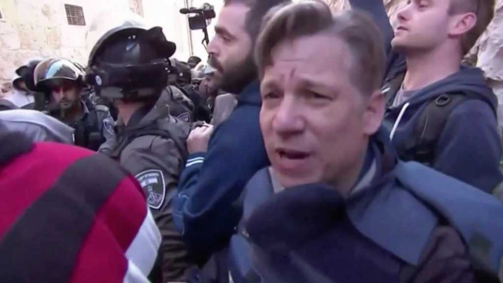 Watch NBC's Richard Engel fight through a crowd in this MSNBC promo ...